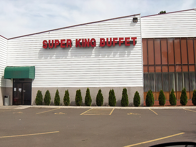 The unassuming exterior of Super King Buffet stands like a culinary fortress, promising treasures within that the modest façade cleverly conceals from passing traffic.