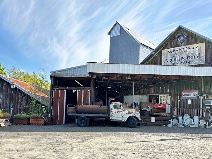 The weathered barn exterior of Aurora Mills isn't just a building—it's a time machine disguised as Oregon's ultimate treasure chest.