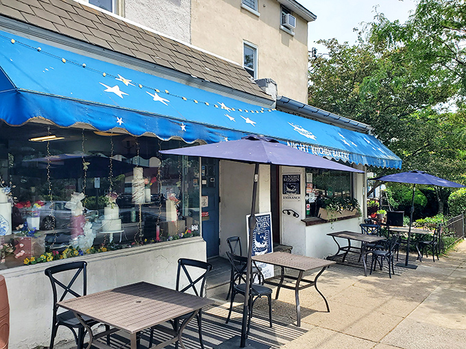 That iconic blue awning with white stars isn't just eye-catching—it's a beacon of baked goodness on Germantown Avenue that draws dessert pilgrims from across Philadelphia.