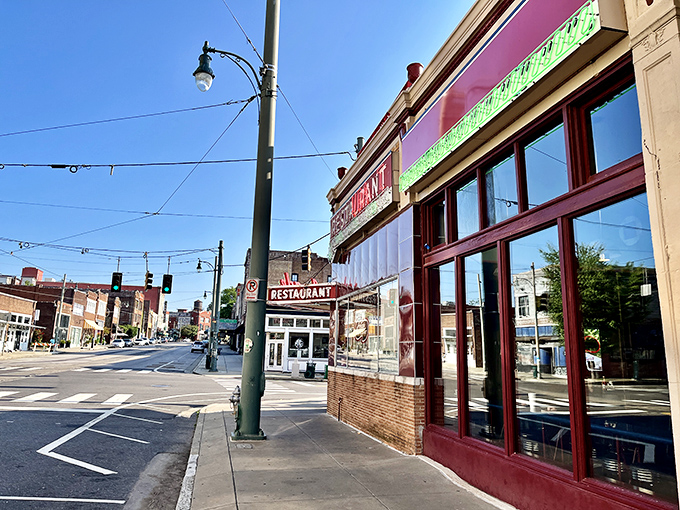 That iconic red exterior isn't just a building—it's a time machine disguised as Memphis's oldest café. The neon practically winks at you.