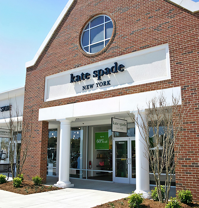 The colonial-inspired architecture of American Eagle Outfitters sets the tone for Williamsburg Premium Outlets—history meets bargain hunting in brick-and-mortar perfection.