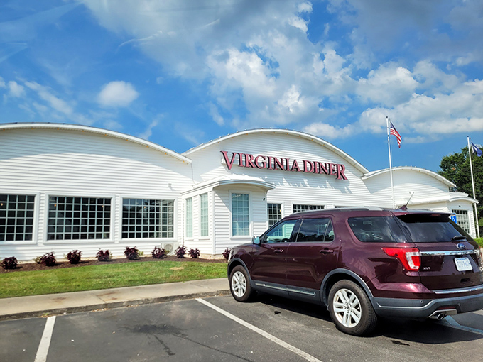 The white curved exterior of Virginia Diner stands proudly against the blue Virginia sky, a beacon of comfort food that's been calling hungry travelers home for generations.