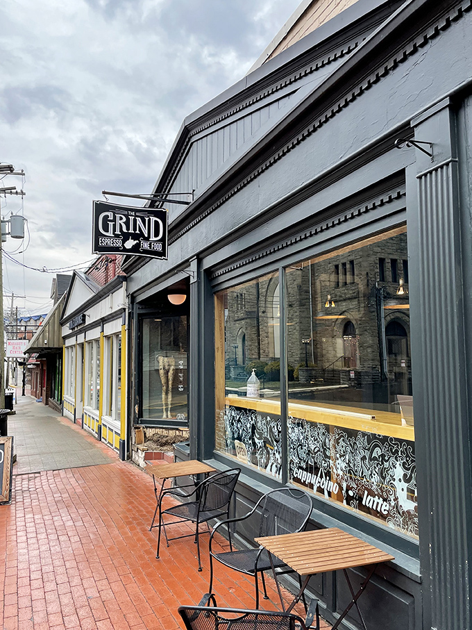 The unassuming storefront of The Grind beckons from Morgantown's brick sidewalks like a caffeine-fueled lighthouse for weary travelers.