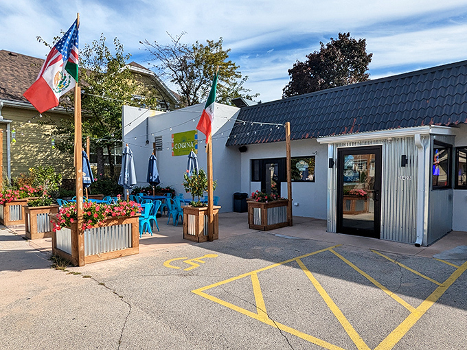 The unassuming white exterior with cheerful blue chairs hints at the culinary treasures within. Like finding a diamond in Wisconsin's cheese country.