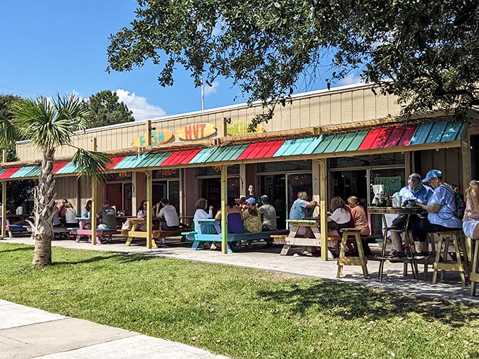 Fish Hut Grill’s laid-back vibe is pure coastal bliss—picnic tables, fresh catch, and sunny smiles all around.