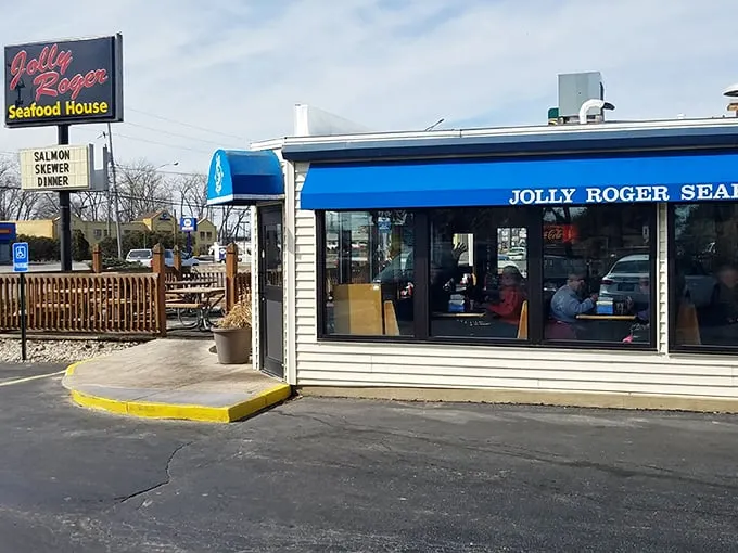 The unassuming exterior of Jolly Roger Seafood House—proof that the best treasures often hide behind the most modest facades. Lake Erie's culinary pirate ship awaits!