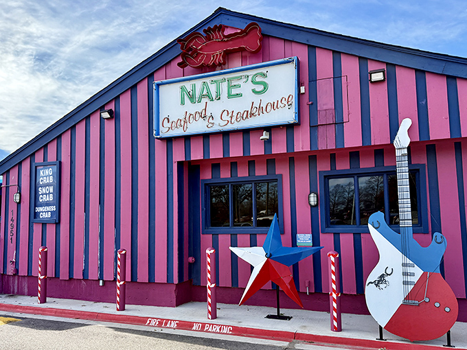 The pink-striped exterior of Nate's stands out like a flamingo in a penguin colony. Three flags flutter above this unassuming seafood sanctuary in Addison.