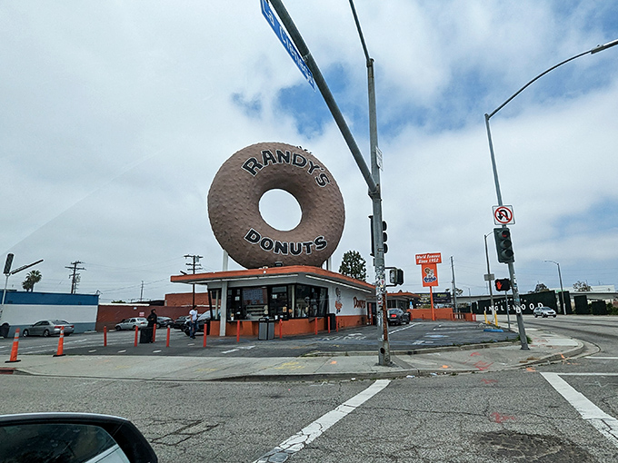 The iconic giant donut sign at Randy's isn't just a landmark—it's a beacon of hope for those suffering from acute pastry deficiency. 