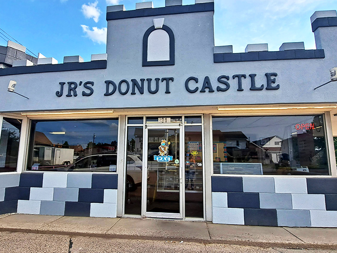 Not all castles have moats and dragons. This one defends against hunger with a fortress of fried dough and a blue-gray façade that says "royalty of the breakfast realm."