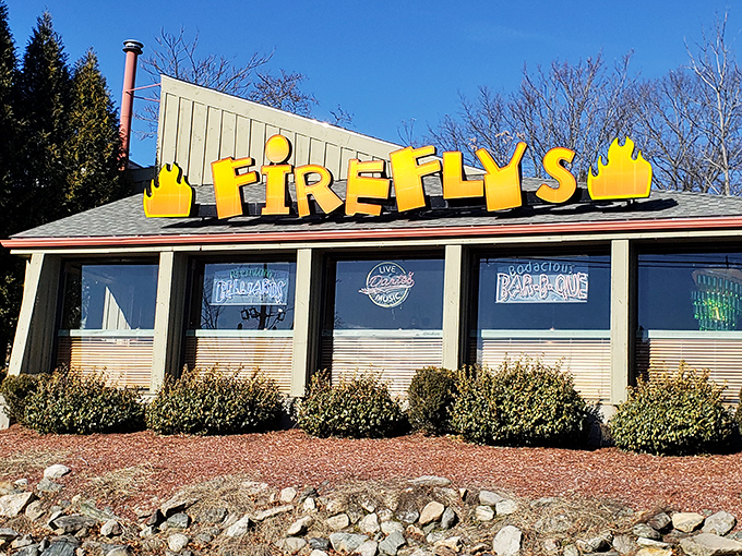 The bright orange Firefly's sign beckons like a barbecue lighthouse, promising smoky salvation to weary travelers on the Marlborough roadside.