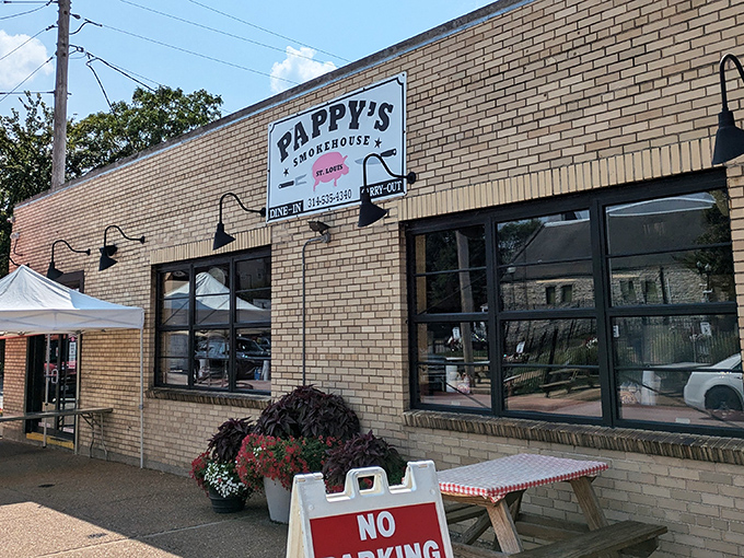 The unassuming yellow brick exterior of Pappy's Smokehouse hides a barbecue paradise within. That line of people? They know something you should too.