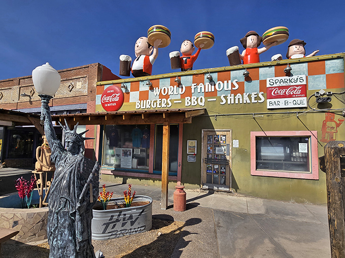 Roadside Americana at its finest! Vintage signs and colorful dinosaurs announce that this isn't your average small-town eatery—it's a full-blown experience.