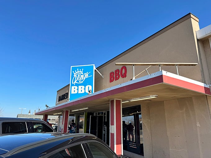 The blue crown sign beckons like a barbecue lighthouse. At King's, they don't need fancy exteriors when what's inside speaks volumes.