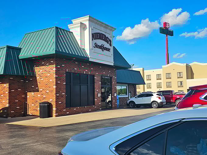 The classic brick-and-green exterior of Niemerg's stands like a culinary lighthouse for hungry travelers. Interstate driving never had such a delicious destination waiting at the end.