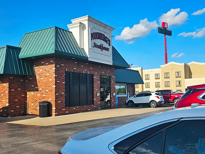 The classic brick-and-green exterior of Niemerg's stands like a culinary lighthouse for hungry travelers. Interstate driving never had such a delicious destination waiting at the end.
