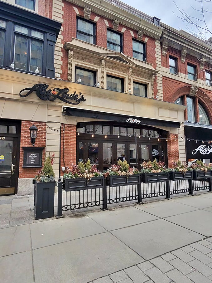 The classic brick façade and elegant signage of Abe & Louie's promises what lies within—a Boston steakhouse experience worth writing home about.