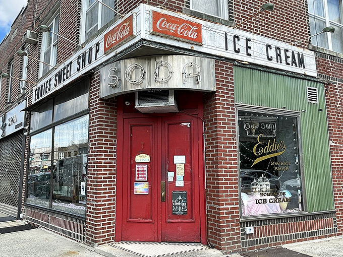 That classic red door and vintage "SODA" sign whisper promises of frozen happiness waiting inside.