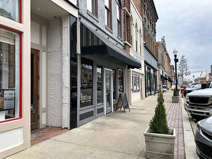 The unassuming storefront of Rosie's Place beckons like a breakfast beacon on Noblesville's historic square. Those outdoor tables have witnessed countless coffee refills and life-changing pastry moments.