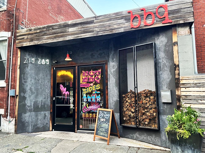 The industrial-chic exterior with its caged firewood display isn't just Instagram bait—it's a smoky promise of what awaits inside. Meat destiny calls. 