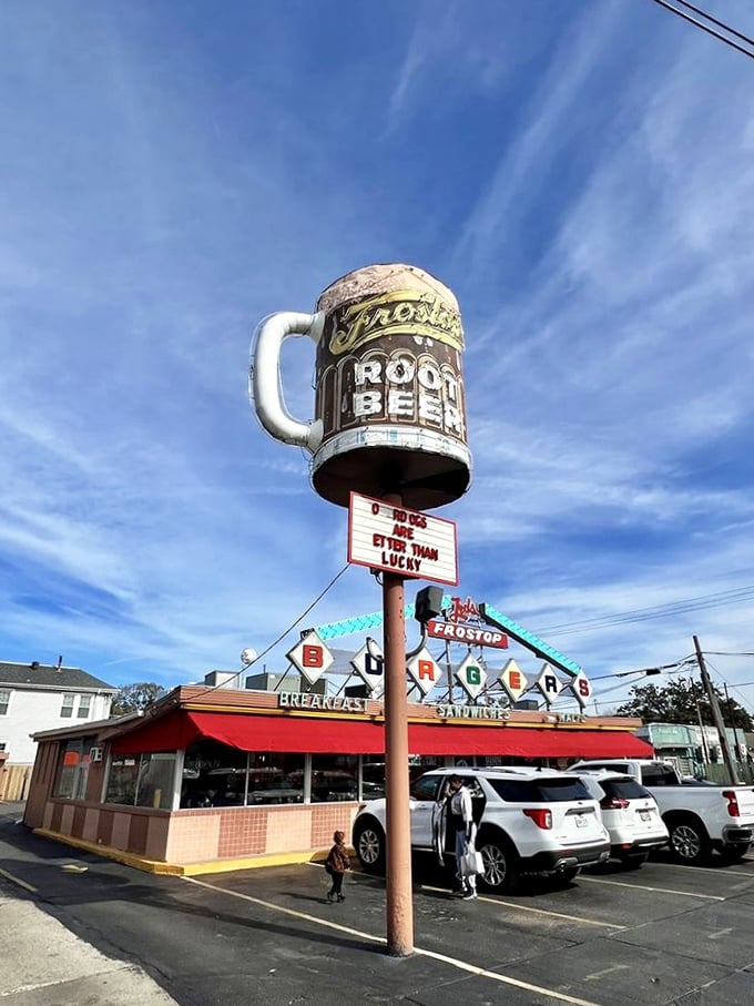That iconic blue and red Frostop sign isn't just a landmark—it's a promise of burger bliss waiting just beyond those doors.