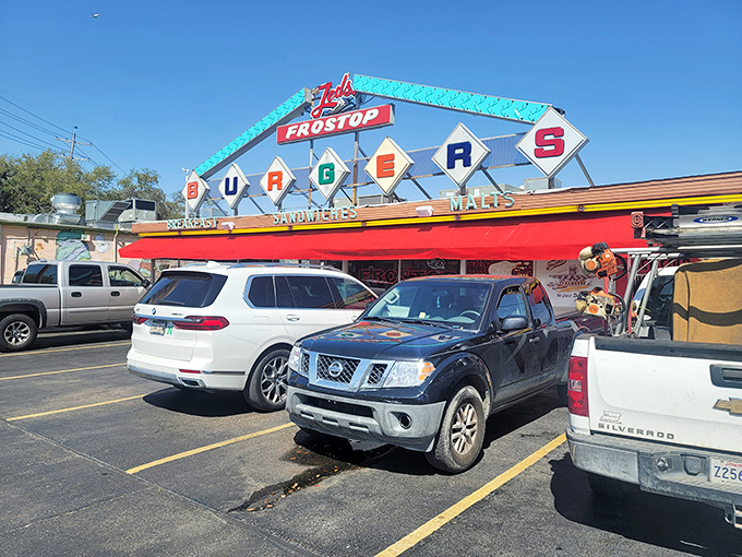 That iconic blue and red Frostop sign isn't just a landmark—it's a promise of burger bliss waiting just beyond those doors.