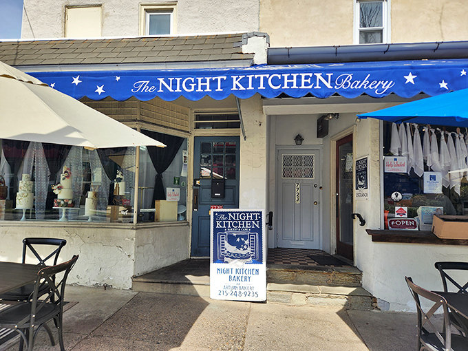 That iconic blue awning with white stars isn't just eye-catching—it's a beacon of baked goodness on Germantown Avenue that draws dessert pilgrims from across Philadelphia.