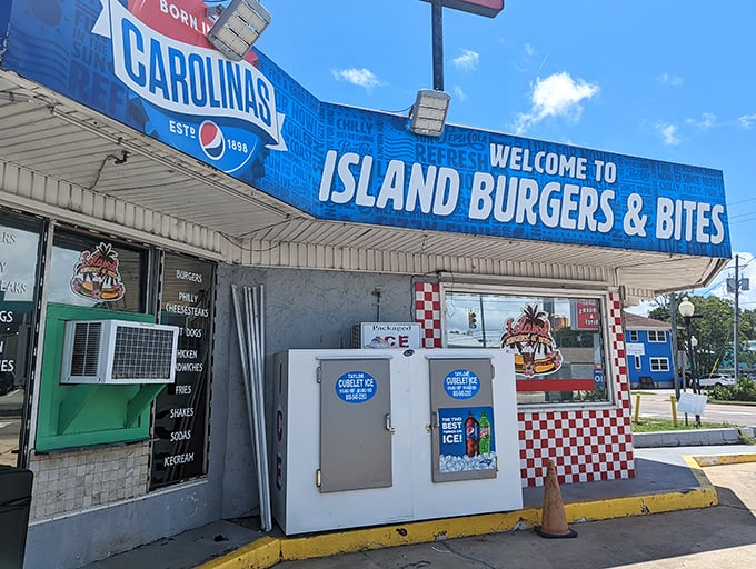 The blue beacon of burger bliss beckons beach-goers with its no-frills charm. Sometimes paradise comes with a side of simplicity.