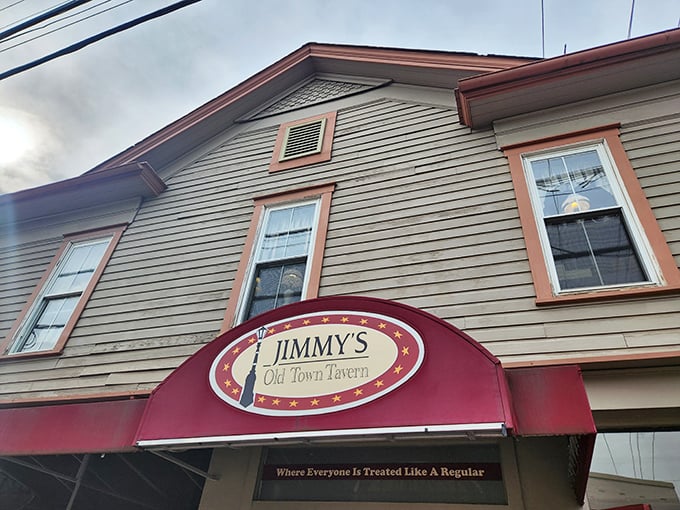 The red awning beckons like a lighthouse for hungry travelers. Jimmy's promise to treat "Everyone Like A Regular" isn't just a slogan—it's their delicious reality. 