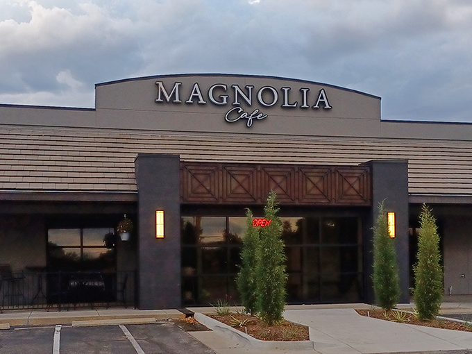 The sleek gray exterior of Magnolia Cafe stands like a culinary beacon in Wichita, promising delicious adventures within. That evergreen isn't just decoration—it's your first hint of the freshness awaiting inside.