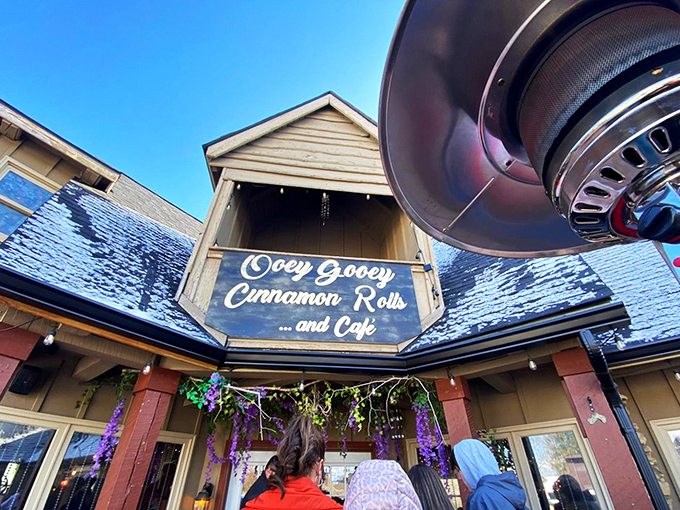 The charming wooden façade of OoeyGooey beckons like a siren song to pastry lovers, complete with butterfly logo that practically whispers, "Follow me to carbohydrate paradise."