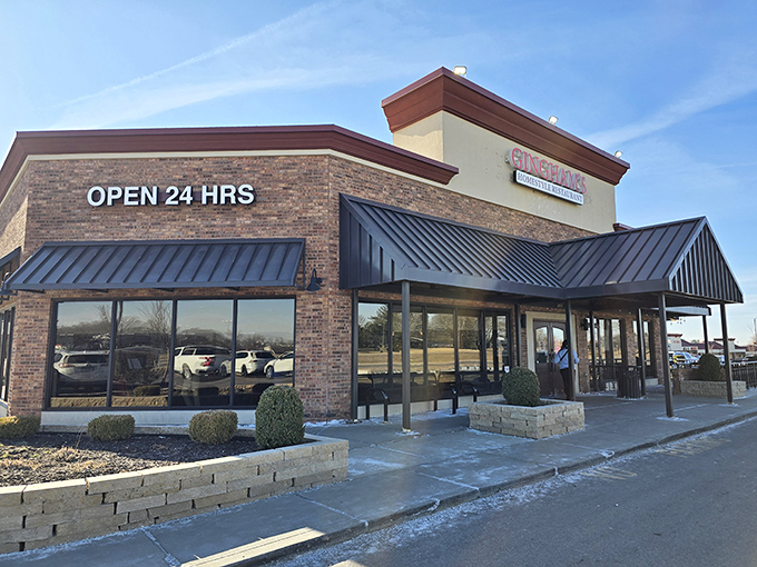 The brick exterior of Gingham's proudly announces "OPEN 24 HRS" – a beacon of hope for hungry night owls and early birds alike.