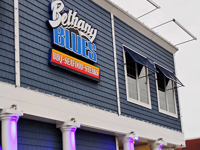 The coastal charm of Bethany Blues' exterior promises what lies within—a temple of smoke where beach vibes meet barbecue brilliance.