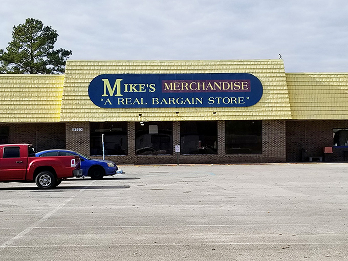 The unassuming yellow facade of Mike's Merchandise promises what the sign boldly declares: "A REAL BARGAIN STORE." Understatement of the century!