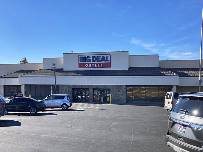 The unassuming exterior of Big Deal Outlet stands like a temple to thriftiness under Idaho's endless blue sky. Retail paradise awaits inside.