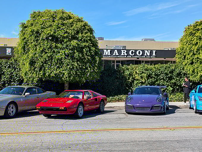 The unassuming exterior of Marconi Automotive Museum belies the treasures within, like finding a Ferrari dealership hiding behind what looks like your accountant's office.