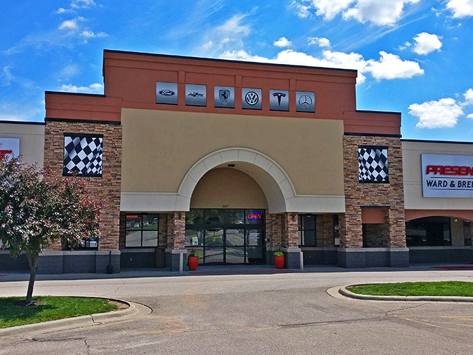The unassuming storefront of Midwest Dream Car Collection proves that in Kansas, extraordinary treasures often hide behind ordinary facades.