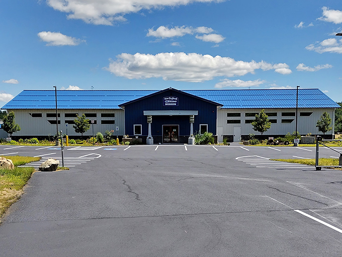 The blue-roofed North East Motor Sports Museum stands ready to welcome visitors, its unassuming exterior hiding a treasure trove of racing history within.