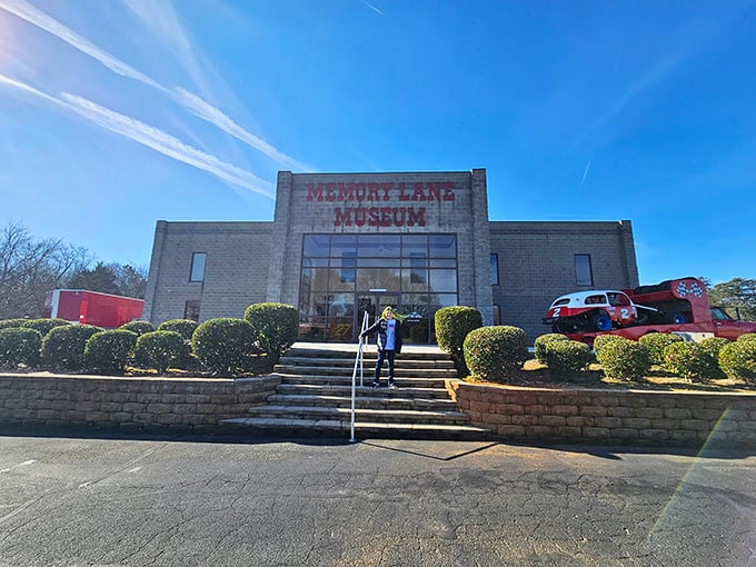 The unassuming exterior of Memory Lane Museum stands like a vault of automotive history, promising treasures that would make any car enthusiast's heart race faster than a NASCAR qualifier.