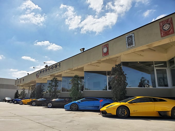 The unassuming exterior of Marconi Automotive Museum belies the treasures within, like finding a Ferrari dealership hiding behind what looks like your accountant's office.