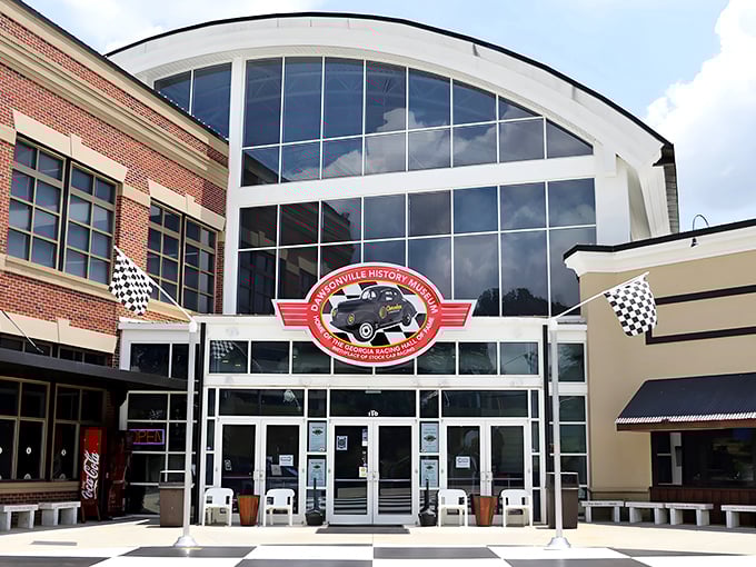The Georgia Racing Hall of Fame's striking facade welcomes speed enthusiasts with its checkered entrance plaza—like rolling out the red carpet, but for people who prefer burning rubber.