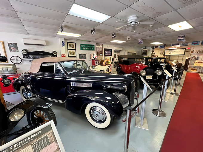 The unassuming gray exterior hides automotive treasures like your grandmother's secret recipe box—except instead of cookies, you'll find Cadillacs.