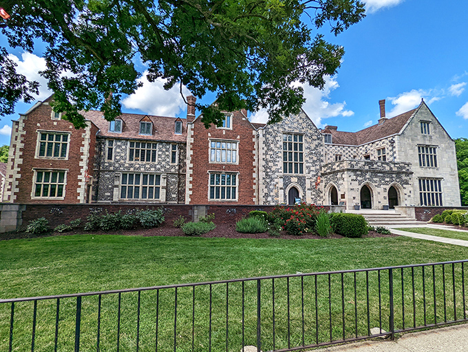 The façade of Salisbury House combines red brick and flint-speckled limestone in a Tudor masterpiece that makes Iowa feel decidedly more Downton Abbey than downtown Des Moines.