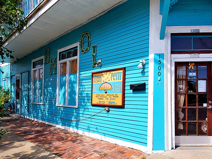 The vibrant blue exterior of Tremé's Petit Jazz Museum stands out like a high note in a quiet melody, inviting curious passersby to discover the treasures within.