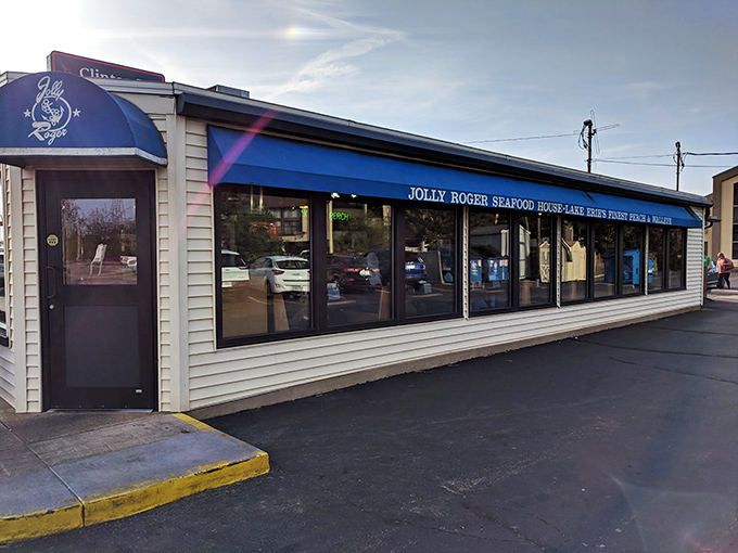 The unassuming exterior of Jolly Roger Seafood House—proof that the best treasures often hide behind the most modest facades. Lake Erie's culinary pirate ship awaits!