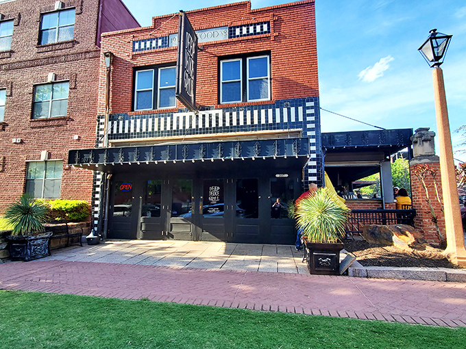 The iconic Deep Deuce Grill sign beckons hungry travelers like a lighthouse for comfort food. Those string lights aren't just decoration—they're a promise of good things to come.