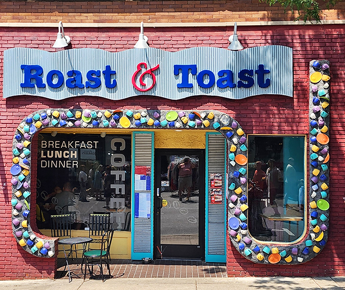 The colorful coffee mug entrance to Roast & Toast isn't just decorative—it's a caffeinated welcome committee promising good things await inside.