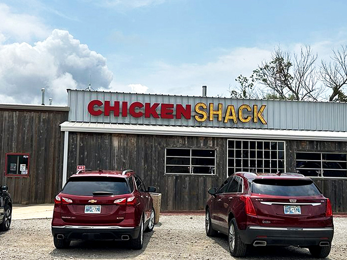 Route 66 nostalgia meets finger-lickin' reality at this weathered roadside gem. The red door practically winks at you, promising delicious secrets inside.
