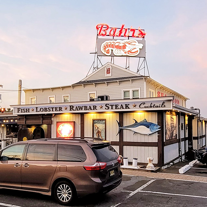 The iconic red "RESTAURANT" sign at Bahrs Landing isn't just advertising—it's a beacon of hope for seafood lovers navigating the Jersey Shore in search of their next great meal.