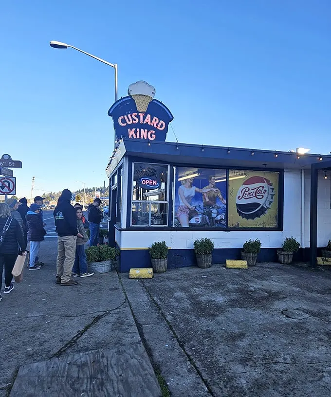 The royal blue trim and vintage sign of Custard King stand proudly against Astoria's sky, like a delicious mirage beckoning custard pilgrims.
