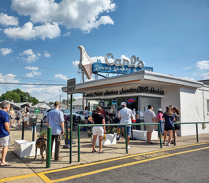 The iconic Art Deco façade of Carl's stands like a beacon of frozen delight against the Virginia sky. Some buildings just scream "summer memories inside!"